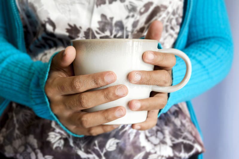 Hands Holding a Mug stock photo. Image of hands, hold - 58728078