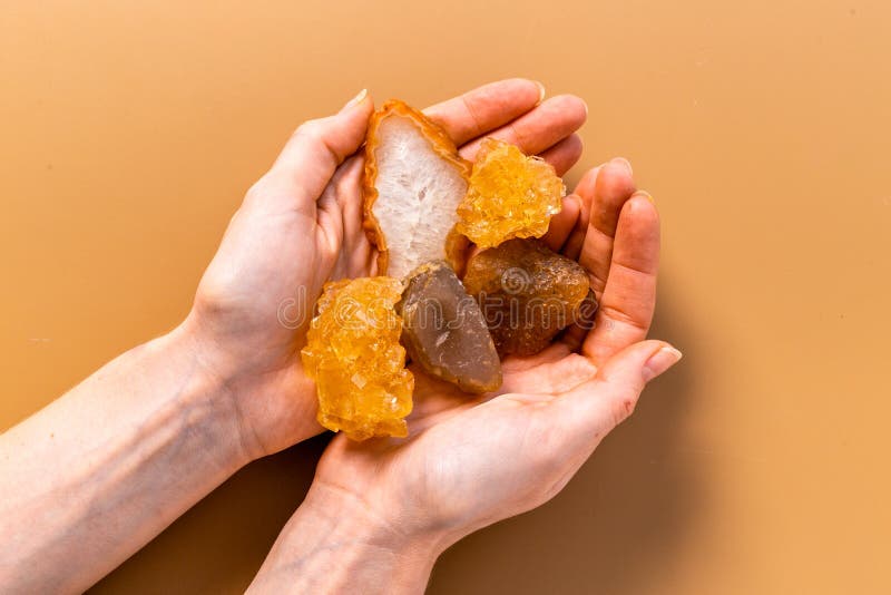 Hands Holding Natural Mineral Rock or Shiny Gemstone Stock Photo ...