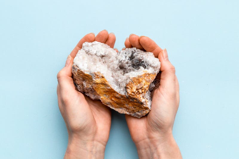 Hands Holding Natural Mineral Rock or Shiny Gemstone Stock Image ...