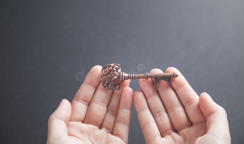 Hands Holding Old Key on Black Background Stock Photo - Image of finger ...