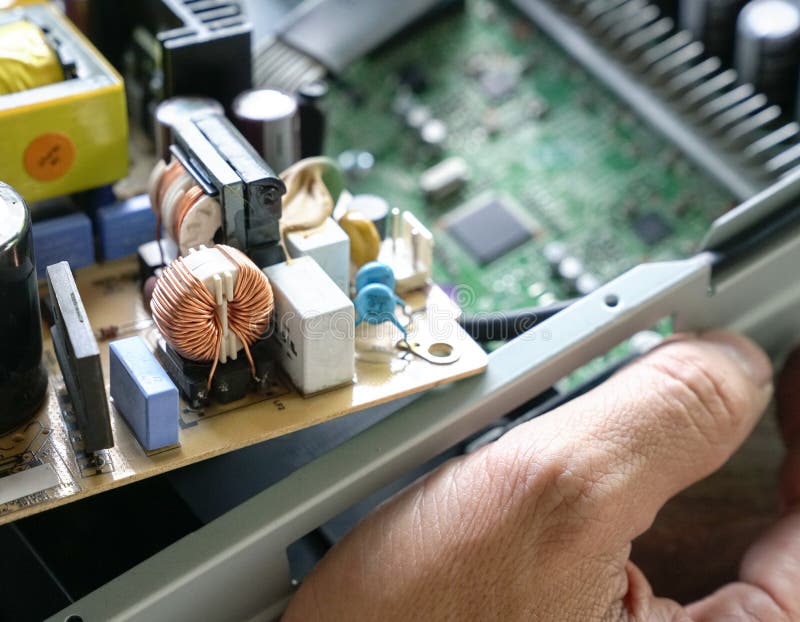 Hands holding PCB board stock photo. Image of device - 163171452