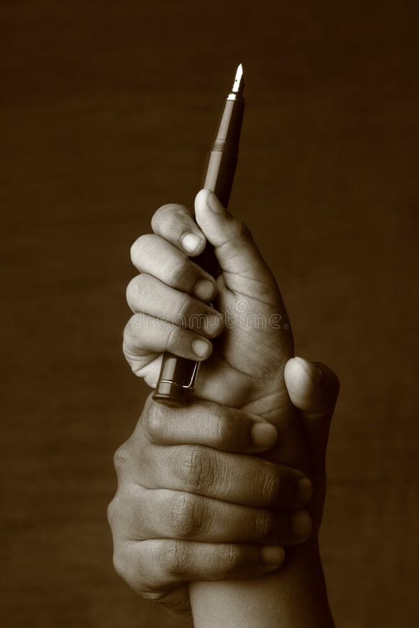 Hands holding pen stock photo. Image of mentor, child - 21636682