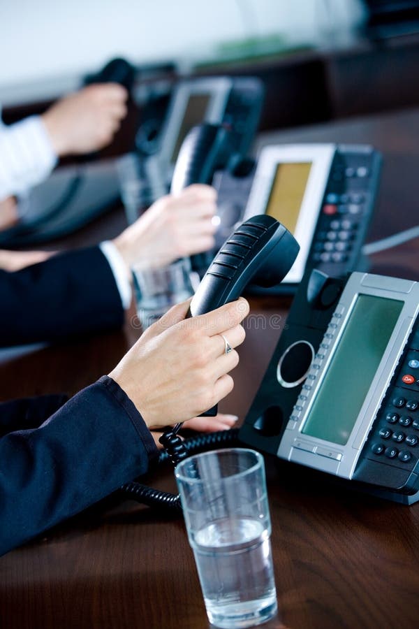 Hands holding phones stock image. Image of hands, connectivity - 7638849