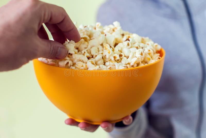 Hands Holding a Popcorn Box. People, Food Concept Stock Image - Image ...