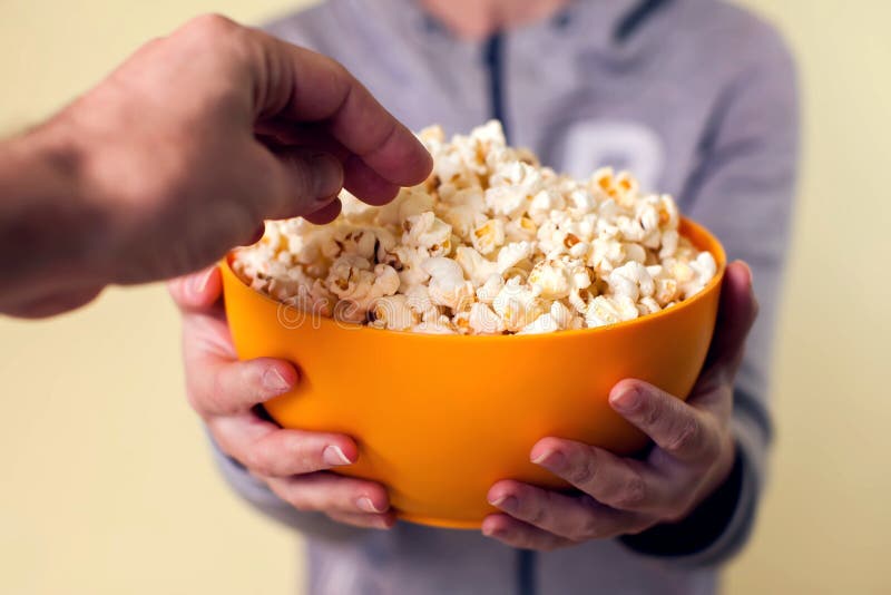 Hands Holding a Popcorn Box. People, Food Concept Stock Image - Image ...