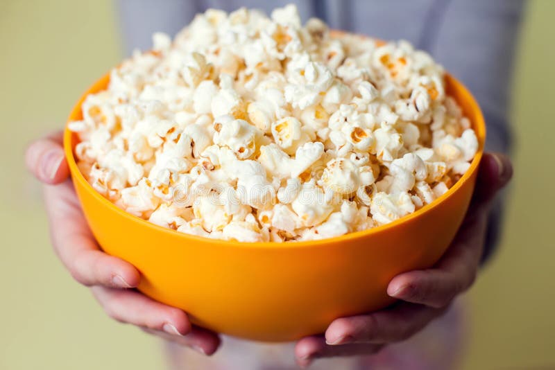 Hands Holding a Popcorn Box. People, Food Concept Stock Image - Image ...