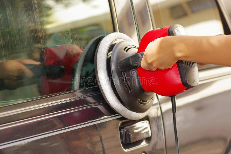 Hands Holding a Power Buffer Machine Cleaning a Car Stock Photo - Image ...
