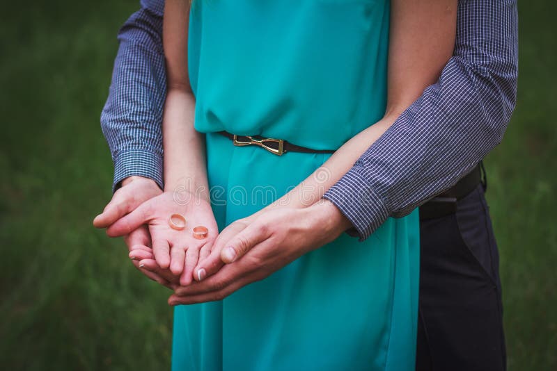 Hands holding rings stock image. Image of design, jewelry - 58056705