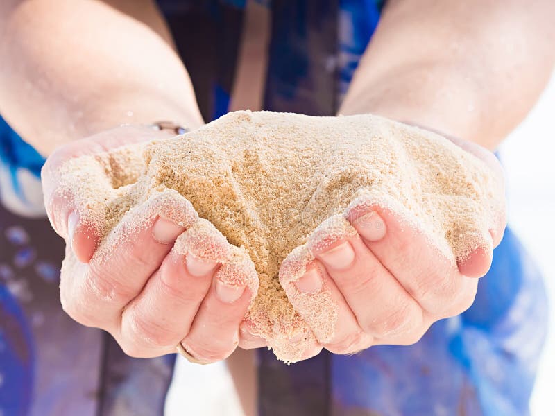 Hands holding sand stock image. Image of outdoors, loss - 37550713