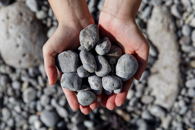Hands Holding Sea Pebbles Afternoon Stock Photo - Image of calm, heap ...