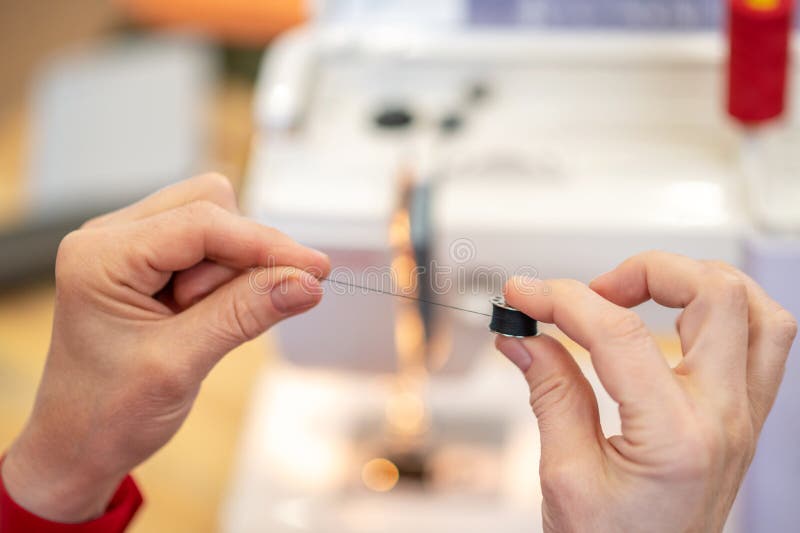 Hands Holding Sewing Spool of Thread Stock Photo - Image of demonstrate ...