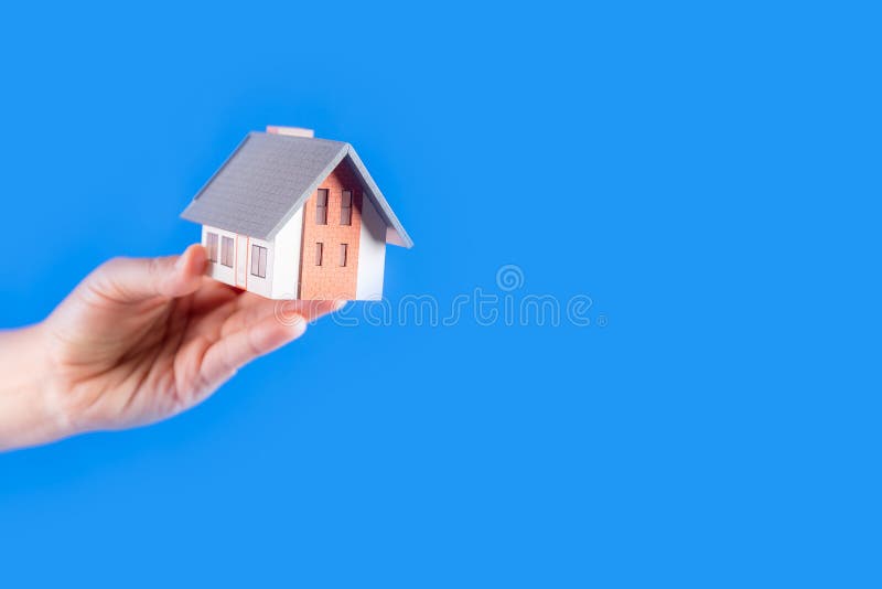 Hands Holding Small Model House Stock Image - Image of finance, concept ...