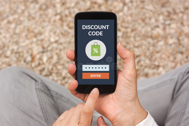 Hands Holding Smart Phone with Discount Code Concept on Screen Stock ...