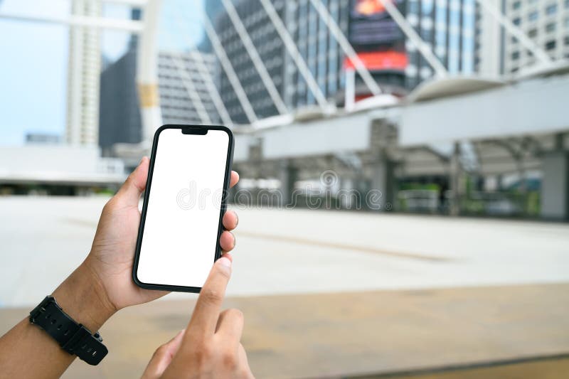 Hands Holding Smartphone with Empty Screen in Urban Area with Cityscape ...