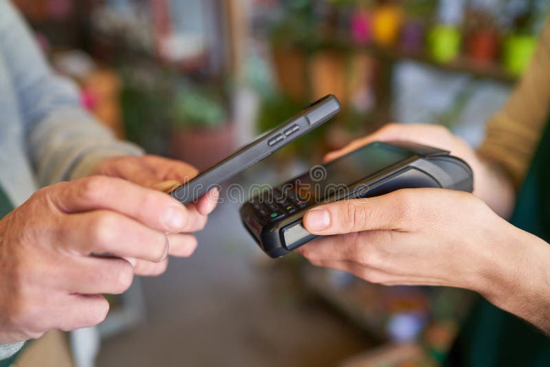 Hands Holding Smartphone and NFC Card Terminal Stock Image - Image of ...