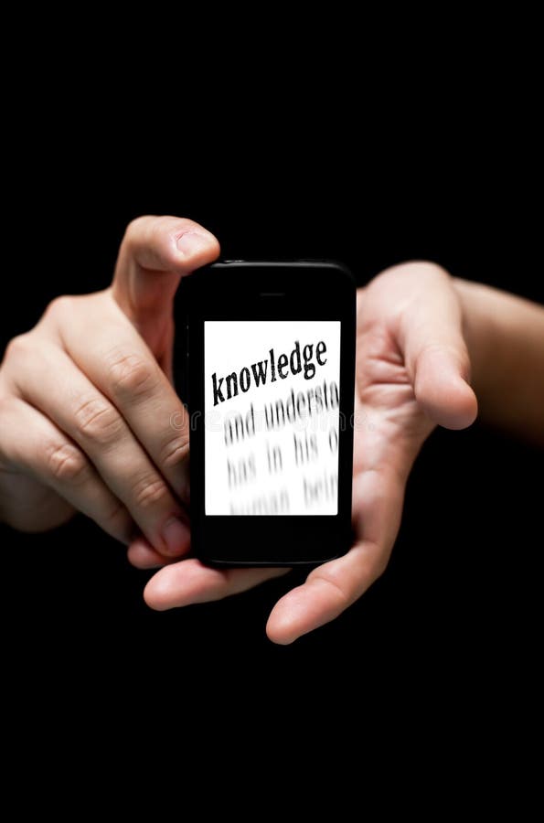 Hands Holding Smartphone, Showing the Word Knowledge Printed Stock ...