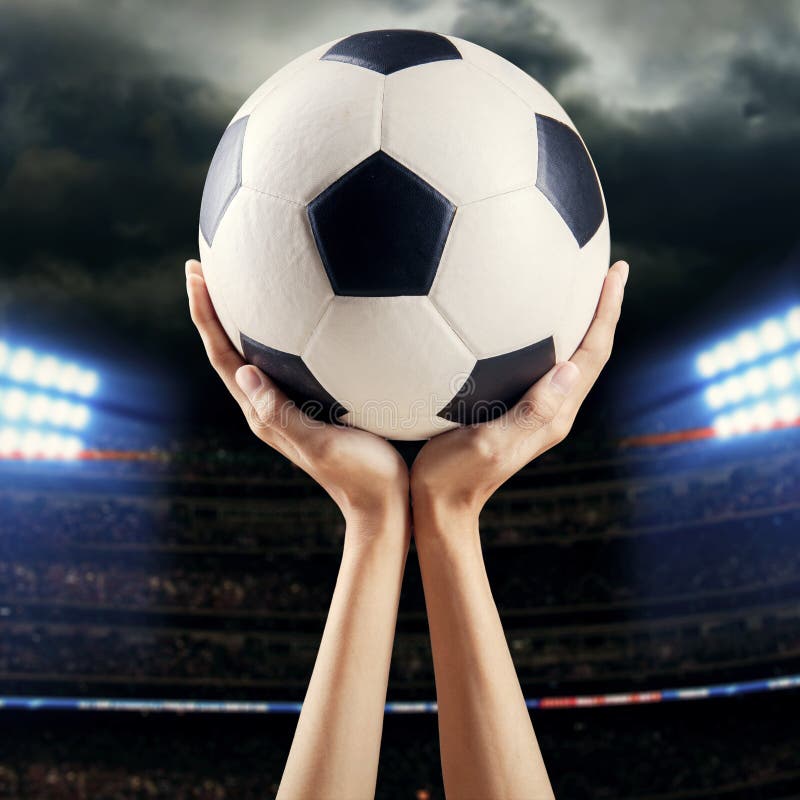 Hands Holding Soccer Ball at Stadium 2 Stock Image - Image of football ...