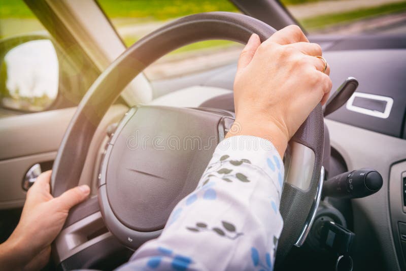 Hands Holding Steering Wheel Stock Photo - Image of sitting, hand ...