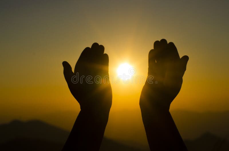 Hands Holding the Sun at Dawn. Freedom and Spirituality Concept Stock ...