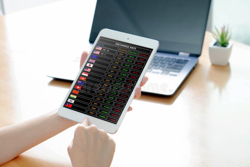 Hands Holding Tablet Currency Exchange Rates Stock Image - Image of ...
