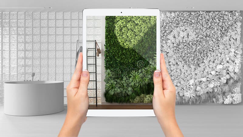 Hands Holding Tablet Showing Bathroom with Vertical Garden, Total Blank ...