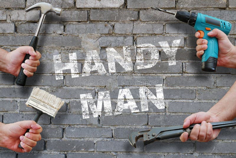 Hands Holding Tools on Grey Brickwall Background with Text Handyman on ...