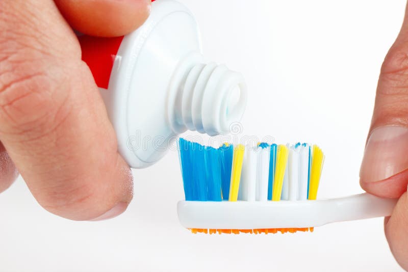 Hands Holding Toothpaste and Toothbrush on White Background Stock Photo ...