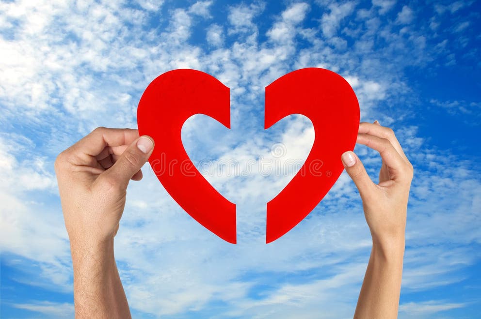 Hands Holding Two Half of Heart Shape with Blue Sky Stock Image - Image ...