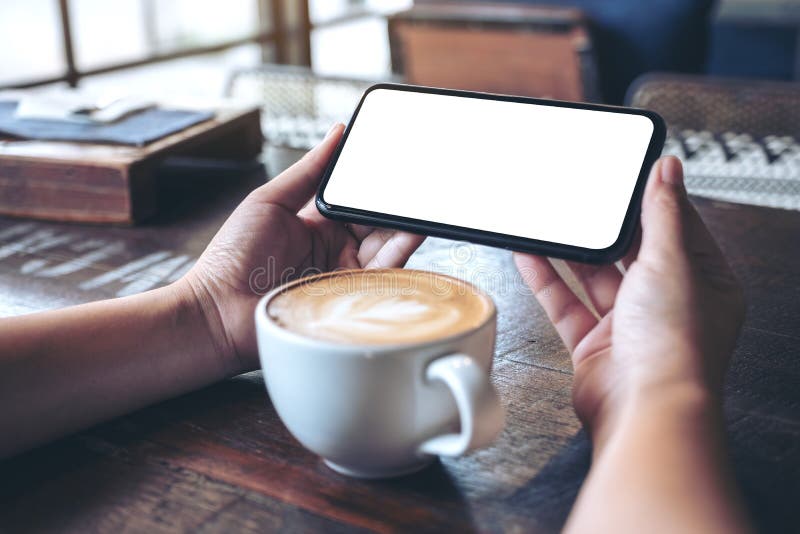 Hands Holding and Using a Black Mobile Phone with Blank Screen ...