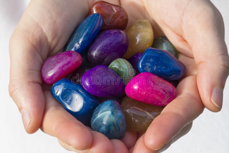 Hands Holding Various Crystal Stones Stock Photo - Image of beautiful ...