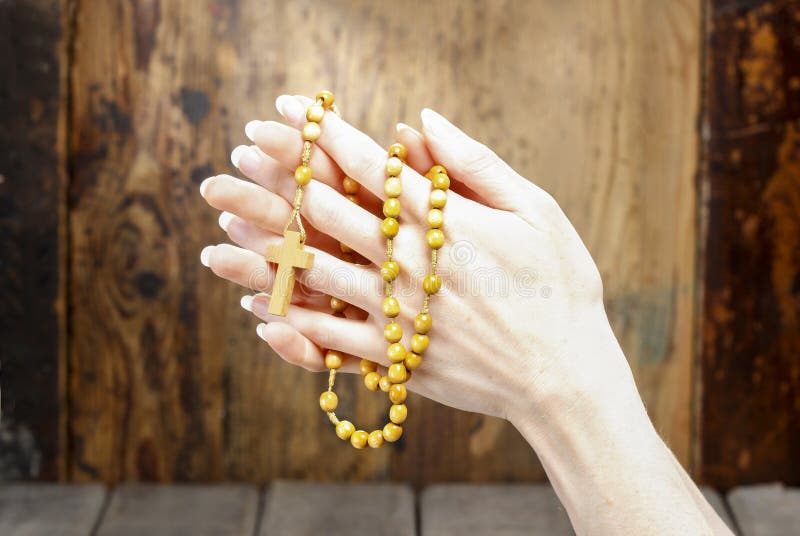 Hands Holding Wooden Rosary Stock Photo - Image of catholic, jesus ...
