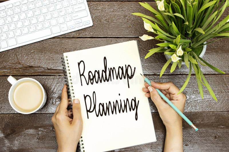Hands Holding Writing Roadmap Planning Text , Desktop. Stock Image ...