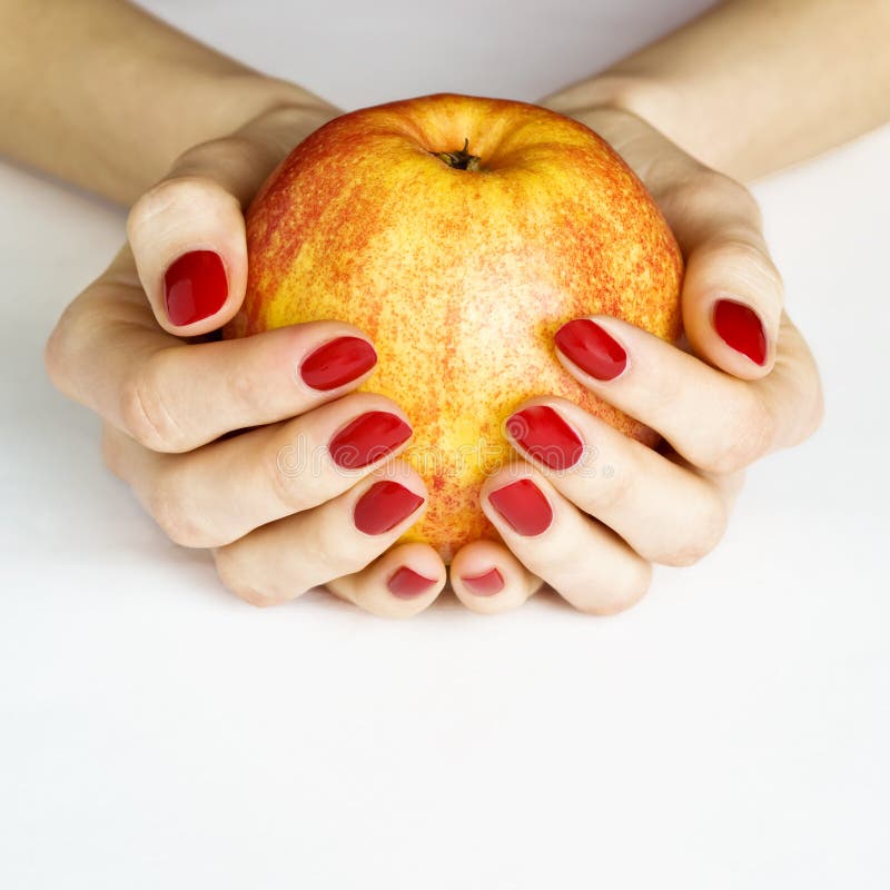 Hands holding yellow apple stock photo. Image of food - 12741542
