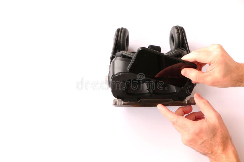Hands Insert a Smartphone for Virtual Reality Glasses VR Stock Photo ... Hands Insert a Smartphone for Virtual Reality Glasses VR Stock Photo ...