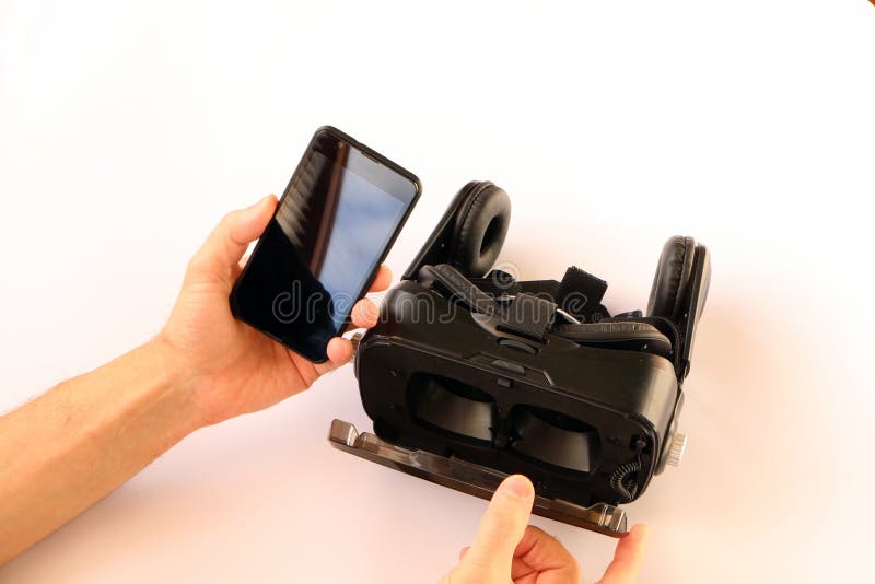 Hands Insert a Smartphone for Virtual Reality Glasses VR Stock Photo ... Hands Insert a Smartphone for Virtual Reality Glasses VR Stock Photo ...
