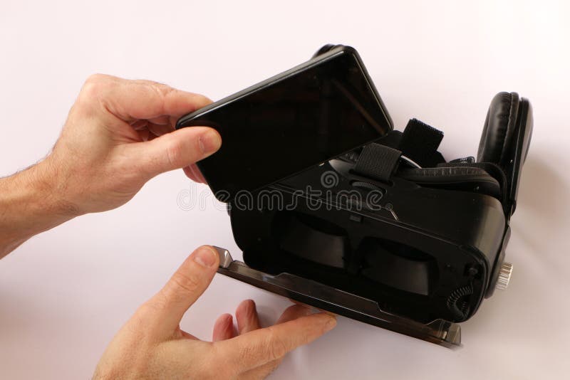 Hands Insert a Smartphone for Virtual Reality Glasses VR Stock Image ...
