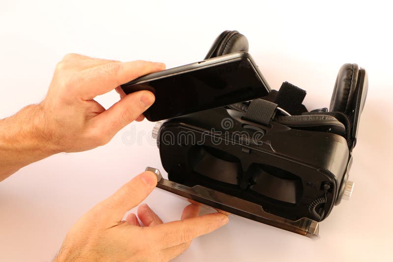 Hands Insert a Smartphone for Virtual Reality Glasses VR Stock Image ...