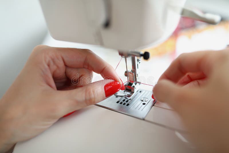 Hands Insert Thread into the Machine Needle Stock Photo - Image of ...