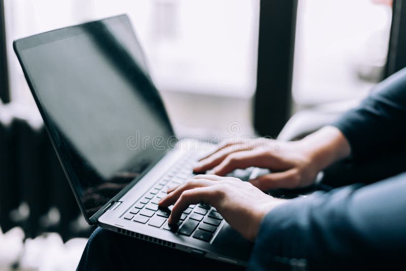 Hands on the Keyboard of the Laptop Type Text. Computer Work Concept ...