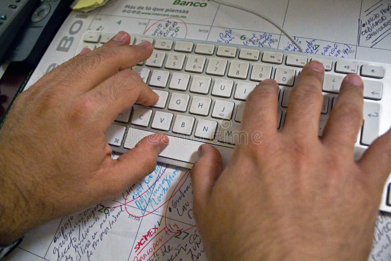 Hands in a keyboard typing stock photo. Image of modern - 141787682