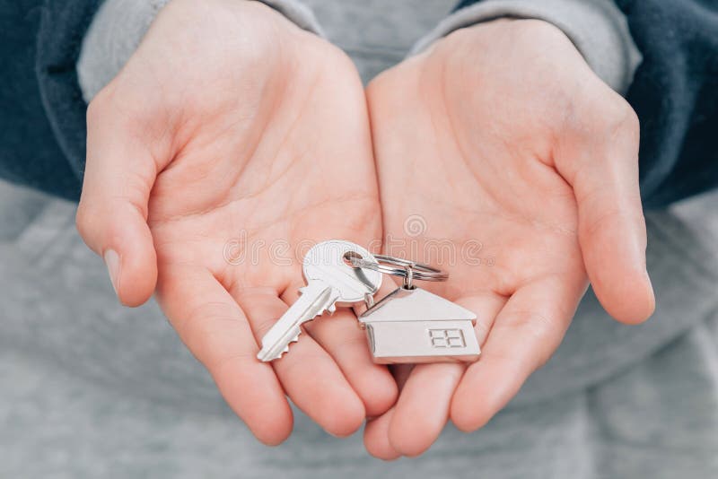 Hands with keychain stock image. Image of tenant, hotel - 245705487