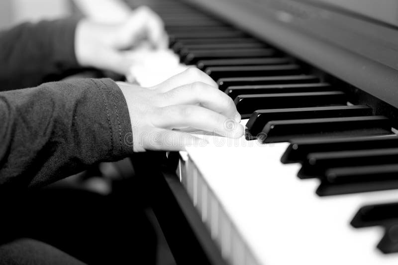 Hands of Kid Playing Piano. Finger Press on White Key Hands of Kid ...