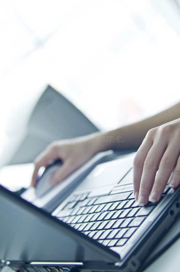 Hands on laptop computer stock image. Image of mouse, working - 4901557