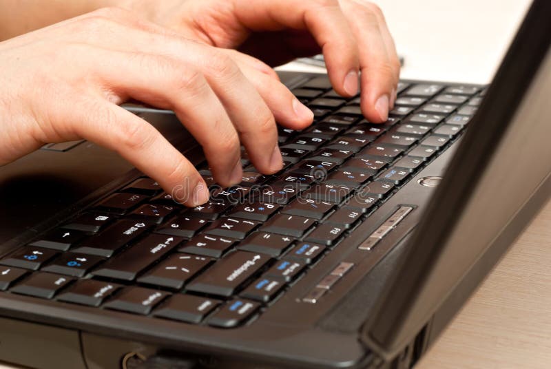 Hands on laptop keyboard stock image. Image of finger - 18612927