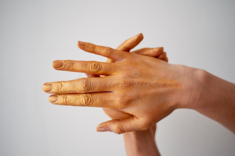 Hands with Long Fingers in Gold Paint.Hand Care Stock Image - Image of ...