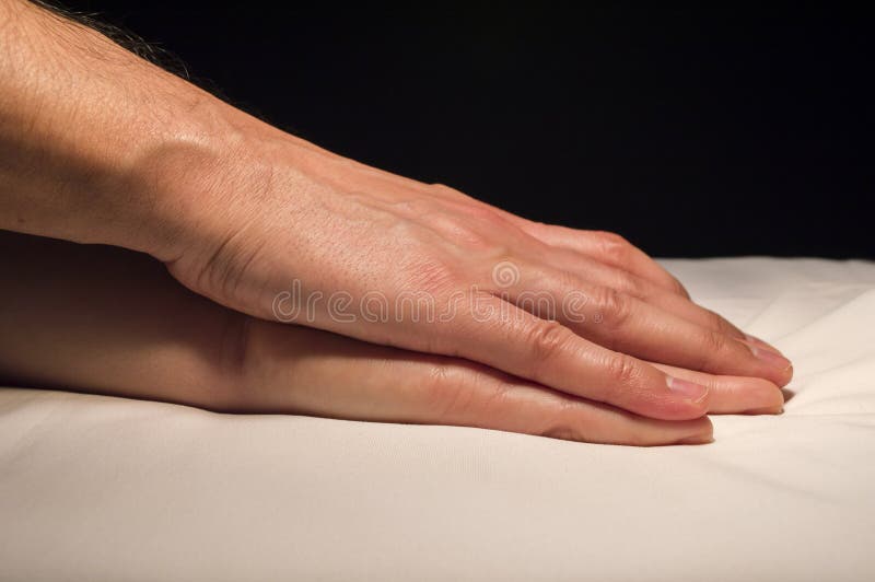Hands of lovers in bed stock photo. Image of hands, adult - 36079628