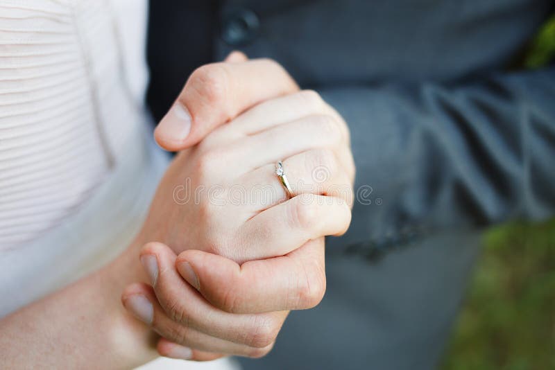 Hands of a Loving Couple. Wedding Ring Stock Image - Image of ...