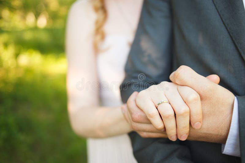 Hands of a Loving Couple. Wedding Ring Stock Photo - Image of ...