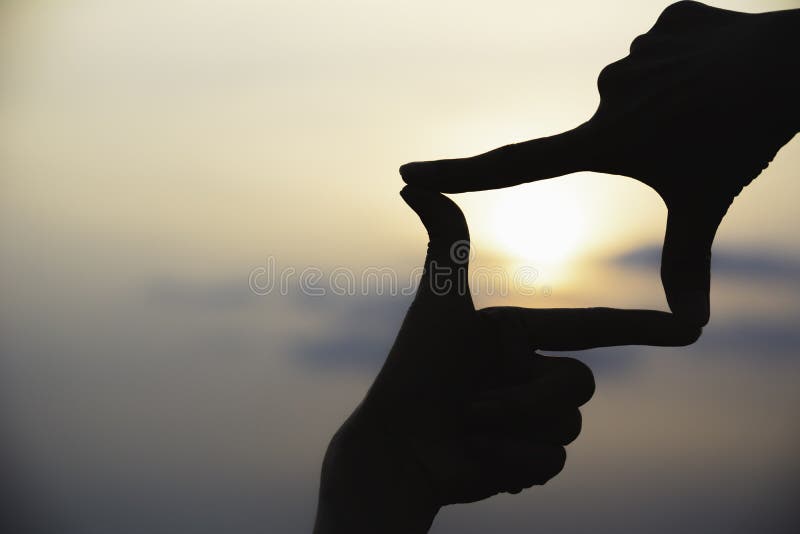 Hands Making Frame with Sunset. Close Up of Woman Hands Making Frame ...