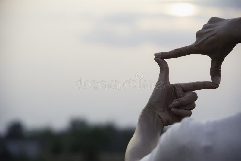 Hands Making Frame with Sunset. Close Up of Woman Hands Making Frame ...